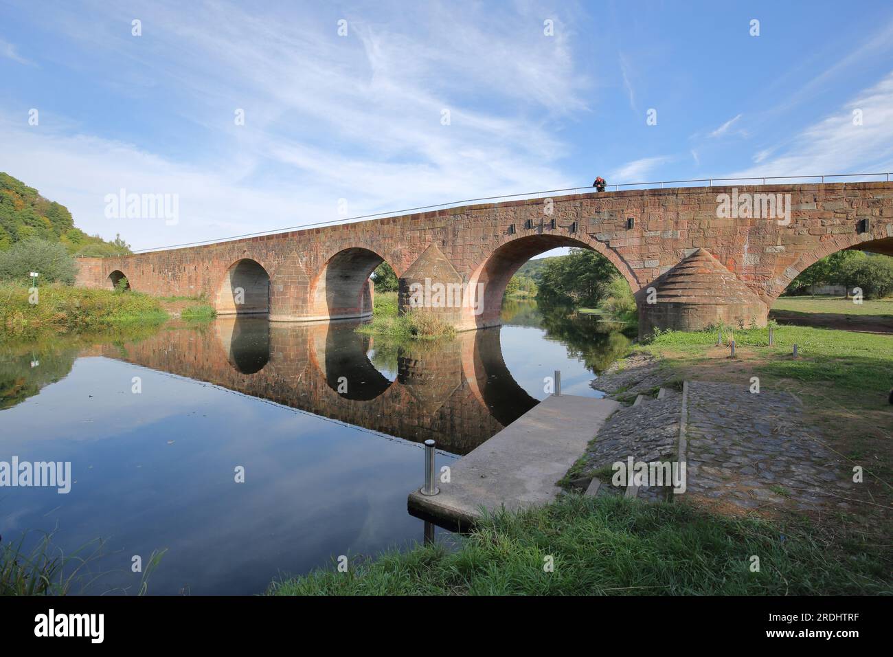 Bridge of Unity, historic stone arch bridge with reflection in the ...