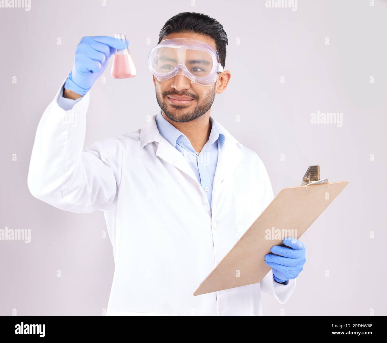 Scientist man, beaker and thinking with checklist, analysis and ppe ...
