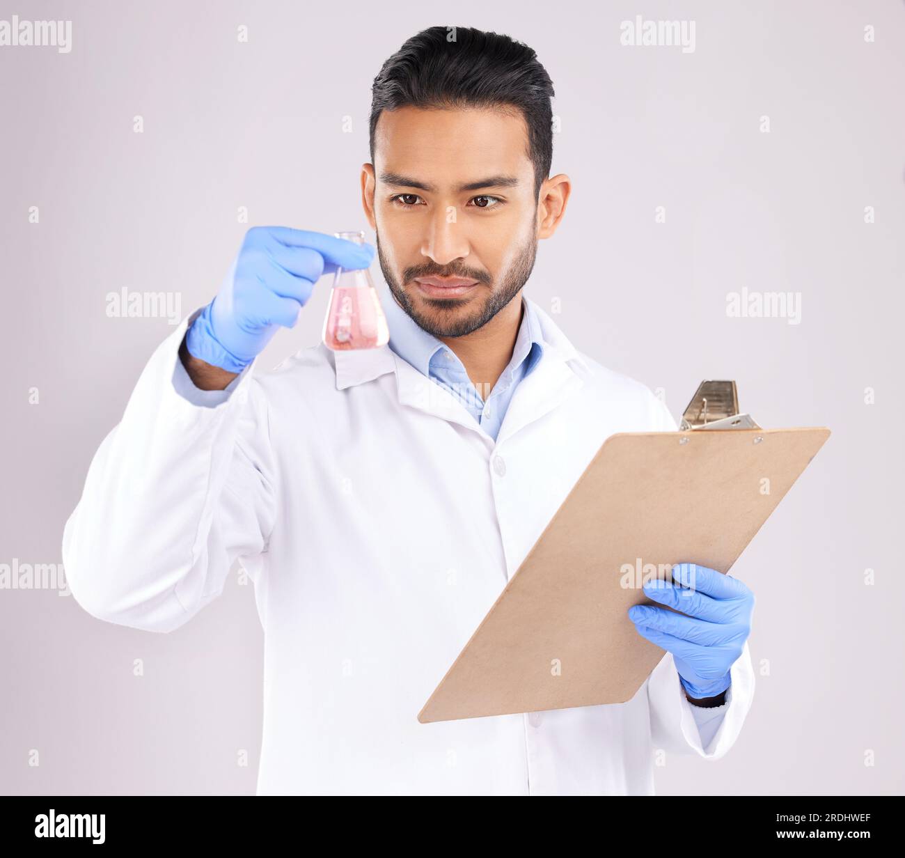 Young scientist man, beaker and checklist with thinking, analysis and ...