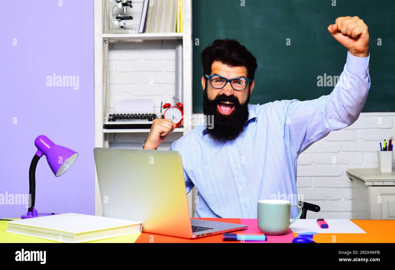 Excited male teacher or student at workplace. Teachers day. Happy ...