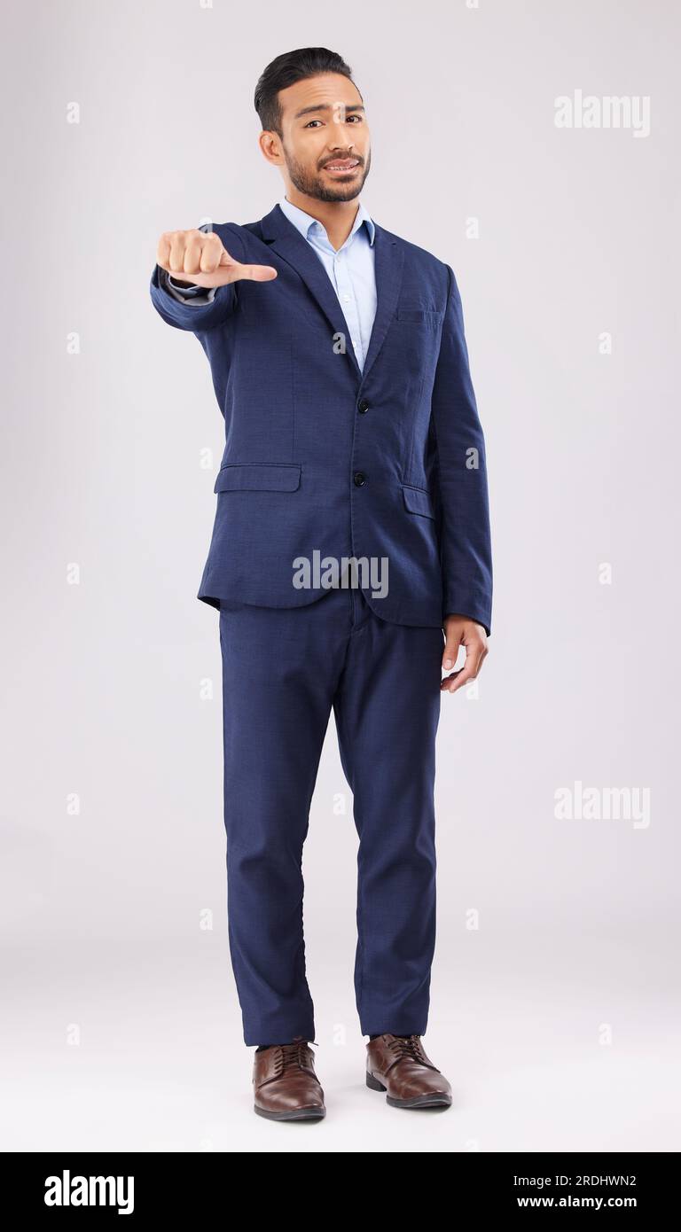 Neutral review, portrait and businessman in suit on a studio background ...