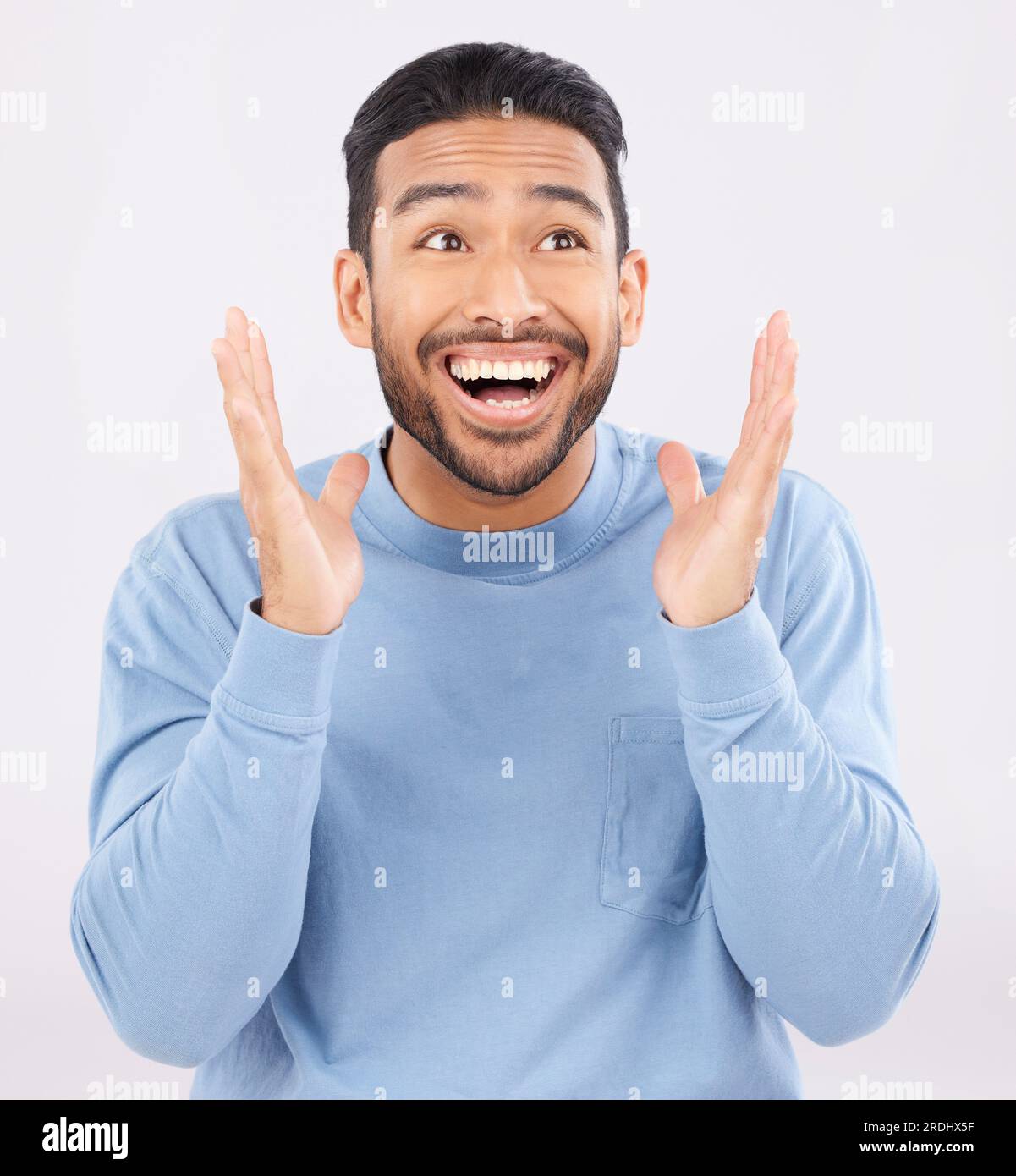Wow, smile and happy asian man in studio for celebration, news or sale ...