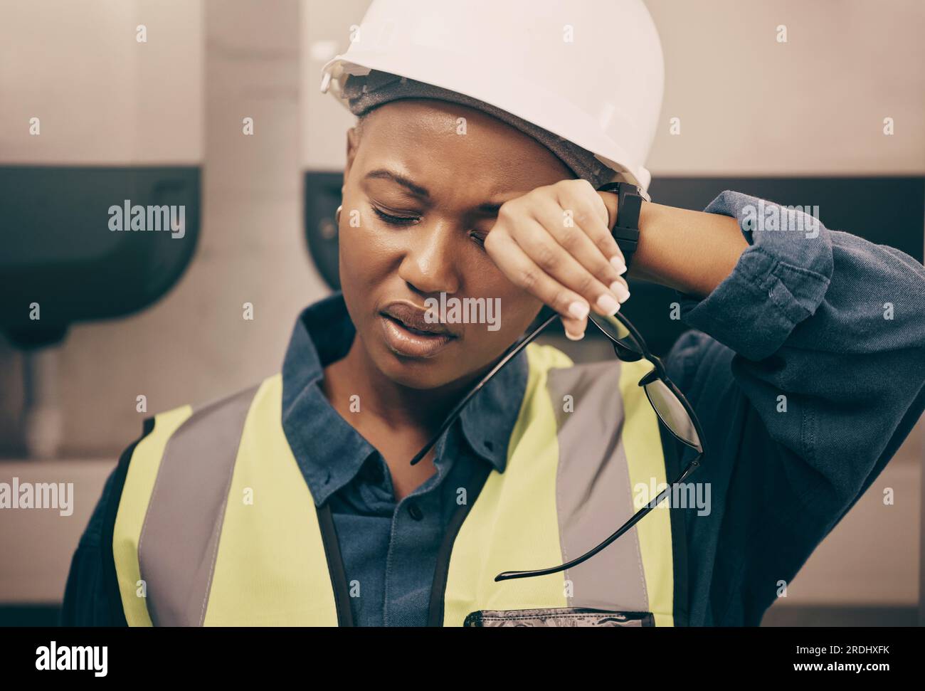 Tired, engineer and black woman with fatigue, headache and deadline ...