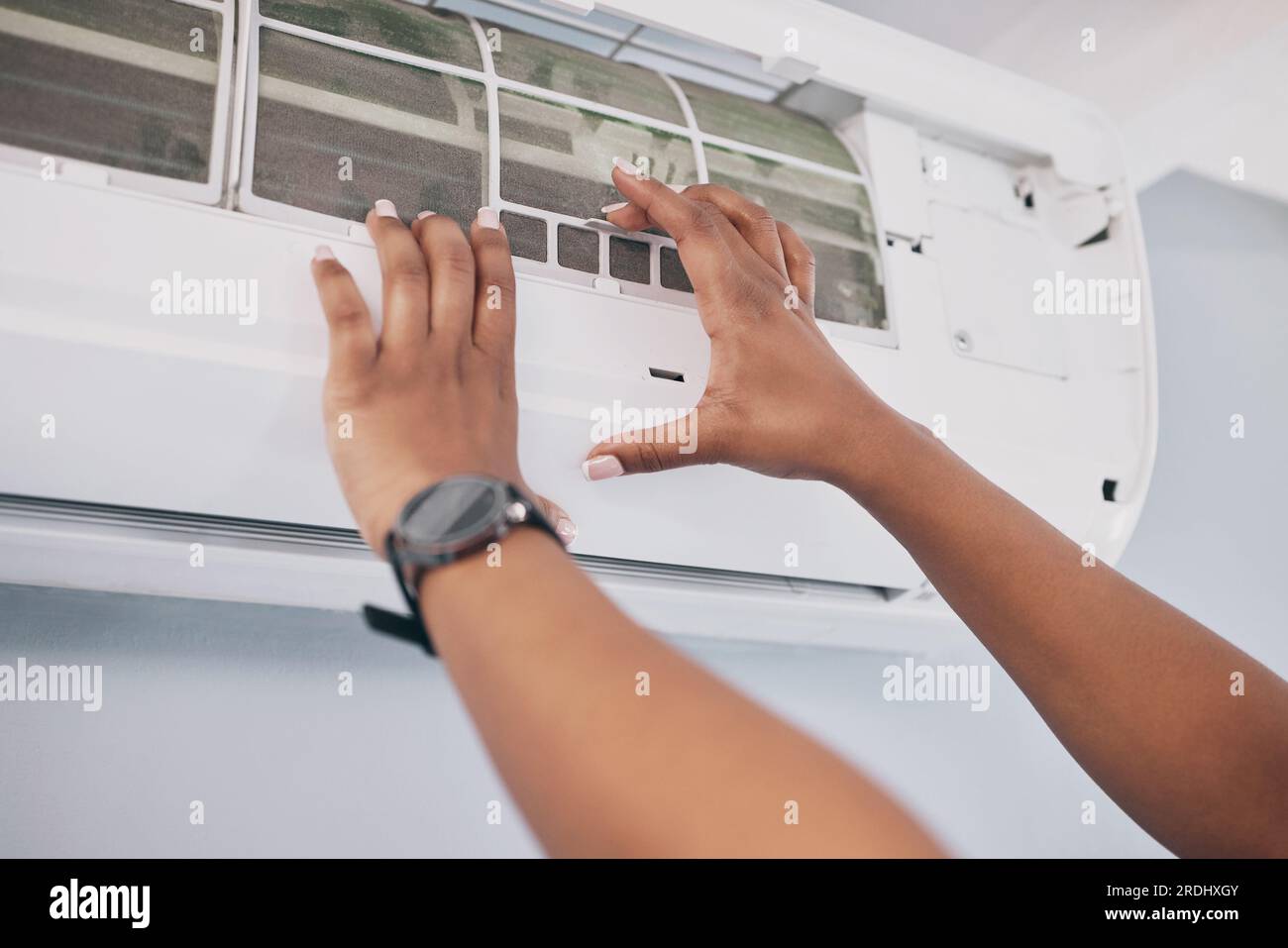 Hands of person, technician and ac repair for electrical system, fan ...