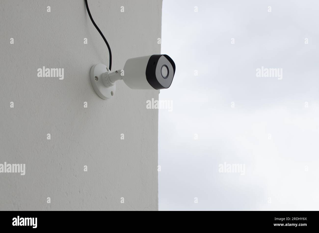 Detail of surveillance camera on the balcony, capturing all angles to ...