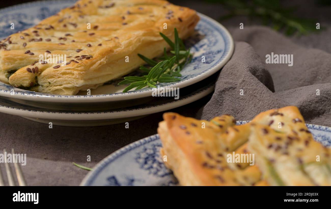 Typical portuguese snack with spinach. Spinach puff pastry with ricotta ...