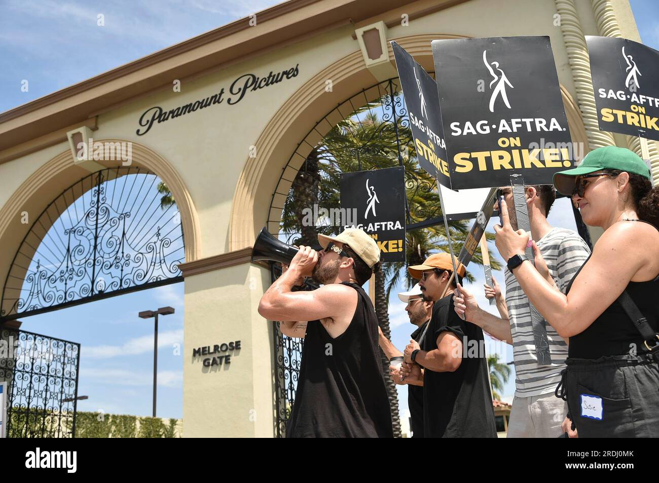 Picketers carry signs outside Paramount studios on Friday, July 21 ...