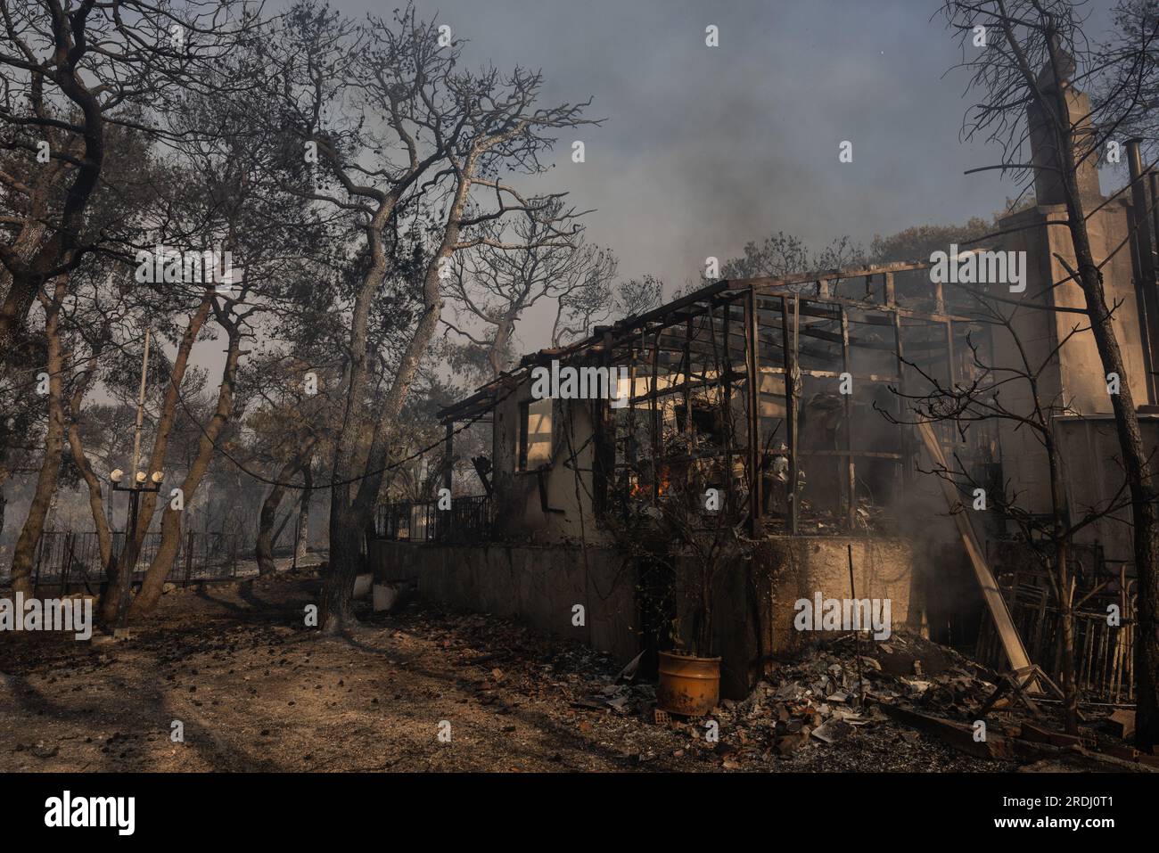 Athens, Greece. 20th July, 2023. A house is destroyed in a wildfire in ...