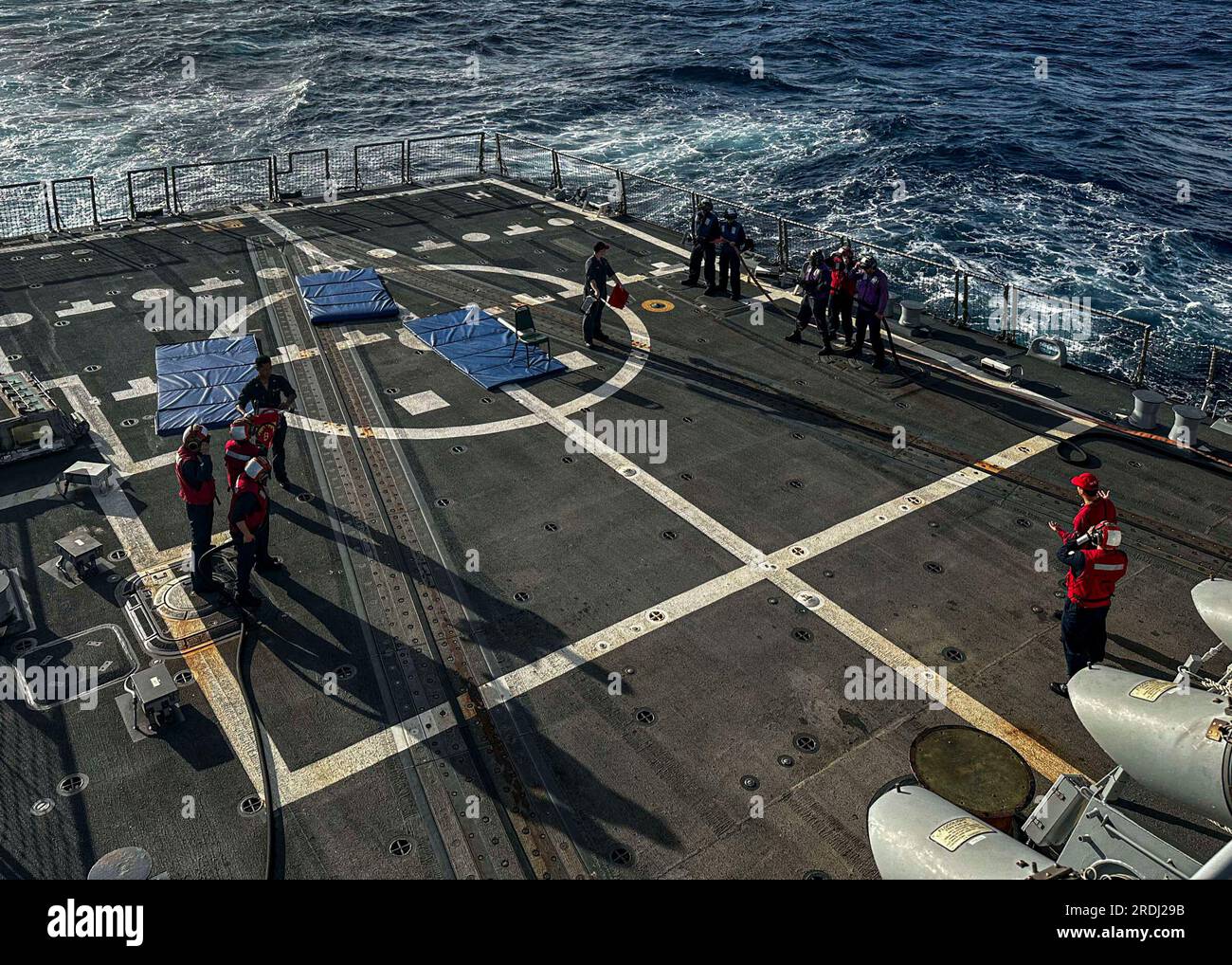 CORAL SEA (July 18, 2023) Sailors aboard the Arleigh Burke-class guided ...