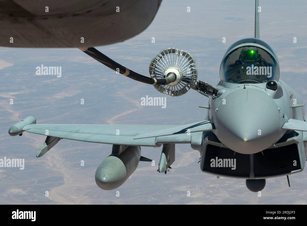 A Royal Air Force Eurofighter Typhoon FGR4 refuels from a KC-10 ...