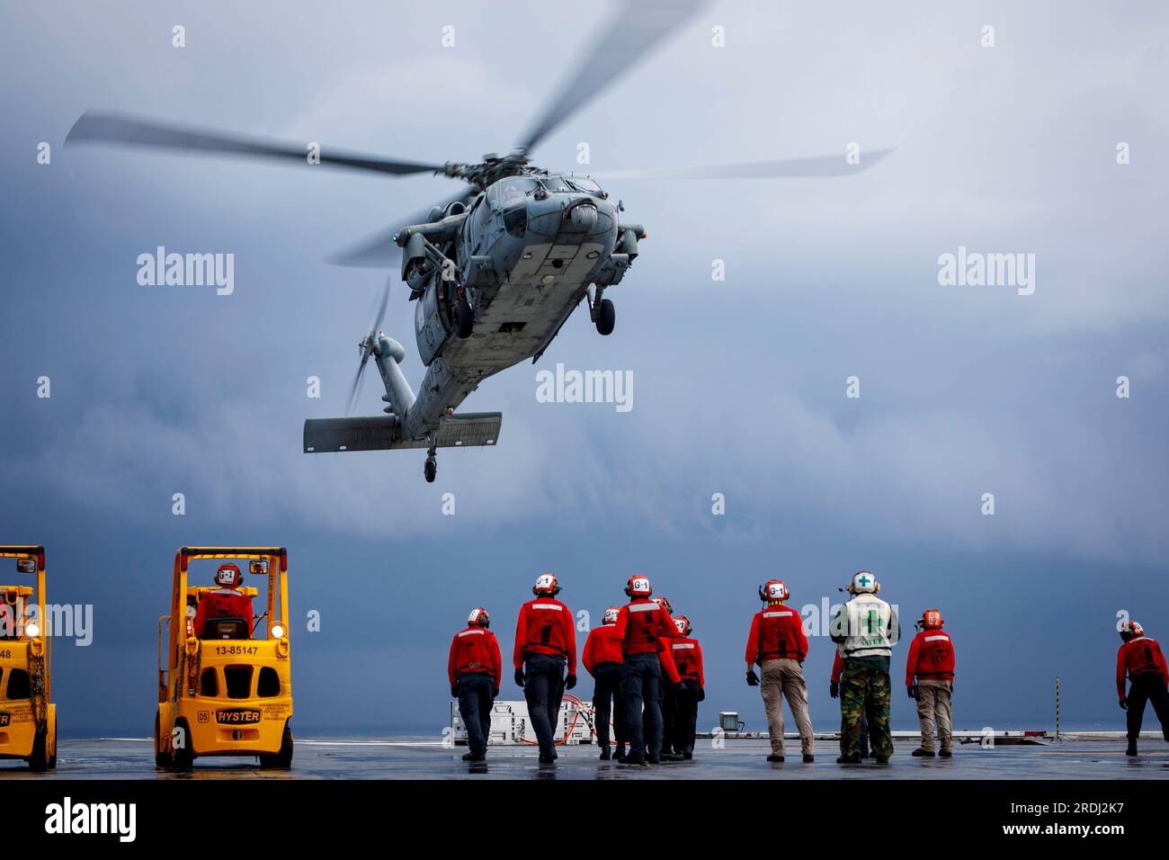 230720-N-TE455-1091 ATLANTIC OCEAN. (July 20, 2023) Sailors stand by on ...