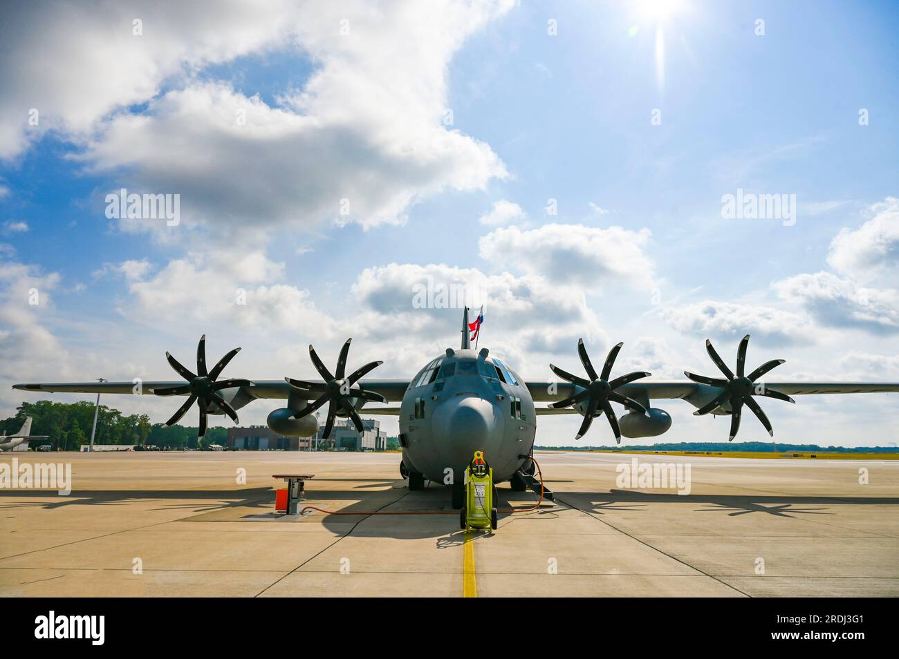 A Georgia state flag is flown from the top hatch door of a U.S. Air ...