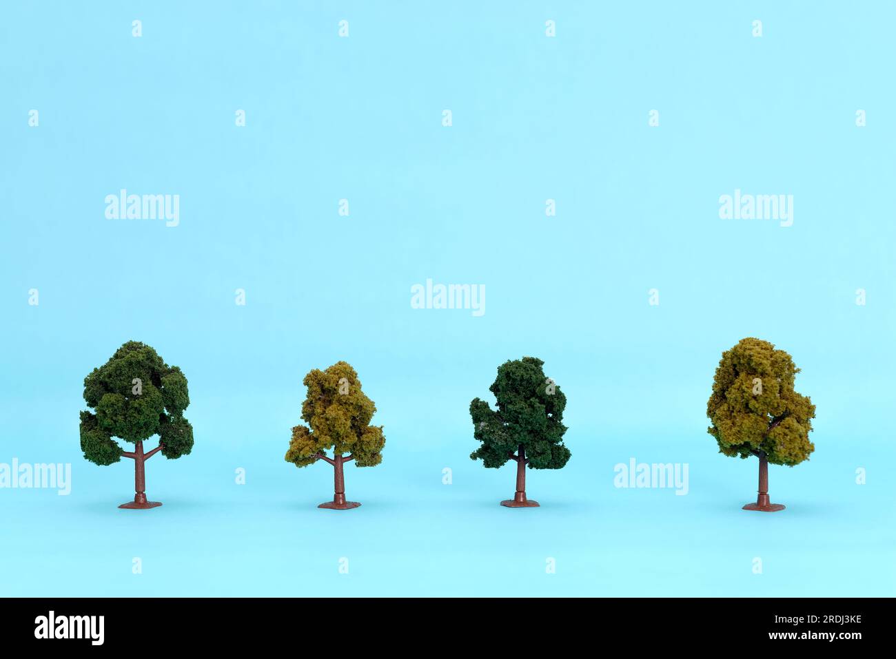 Artificial tree to scale on a blue background. Isolated tree Stock ...