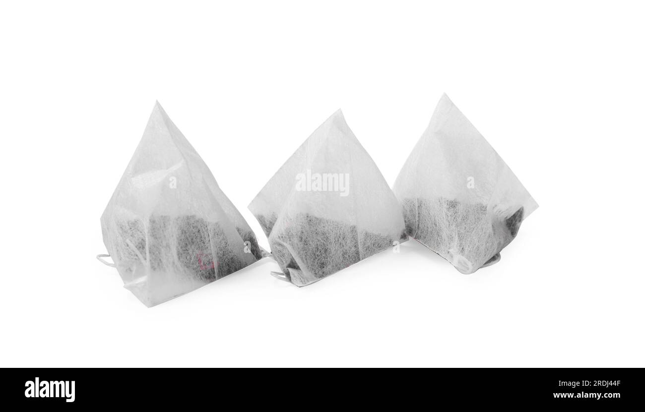 Three new tea bags on white background Stock Photo - Alamy