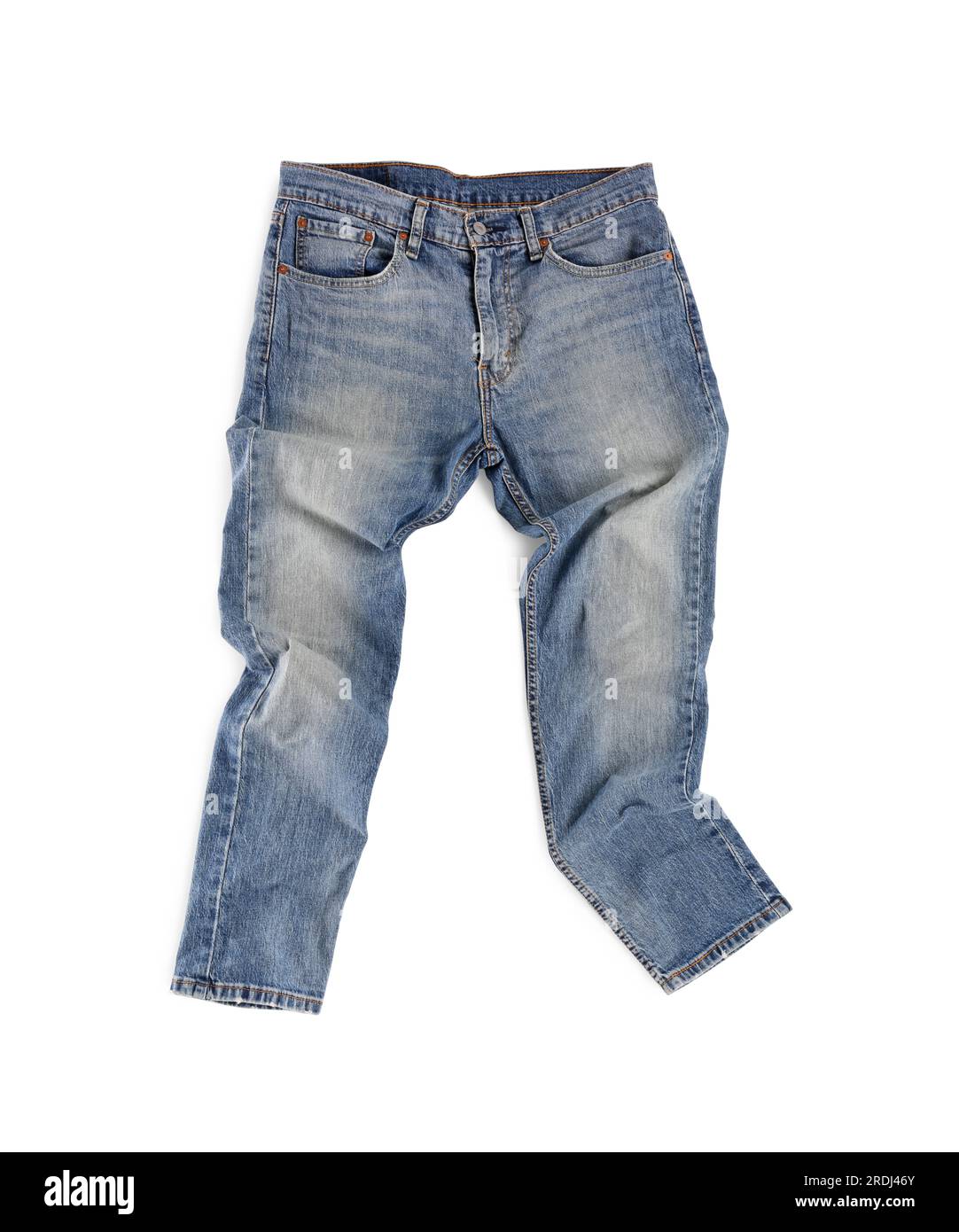 Rumpled blue jeans isolated on white, top view. Stylish clothes Stock ...