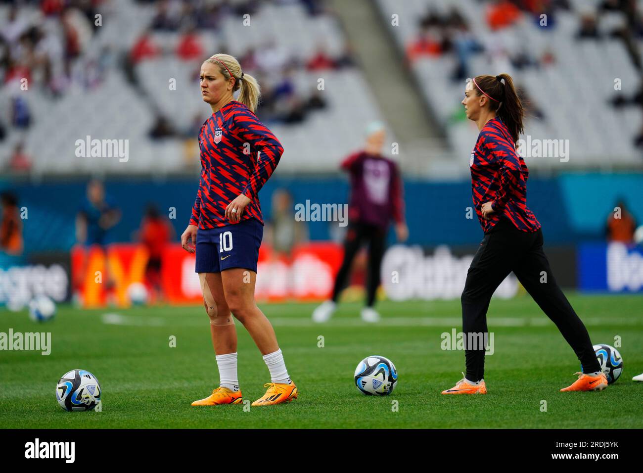United States' Lindsey Horan, left, and Alex Morgan warm up before the ...
