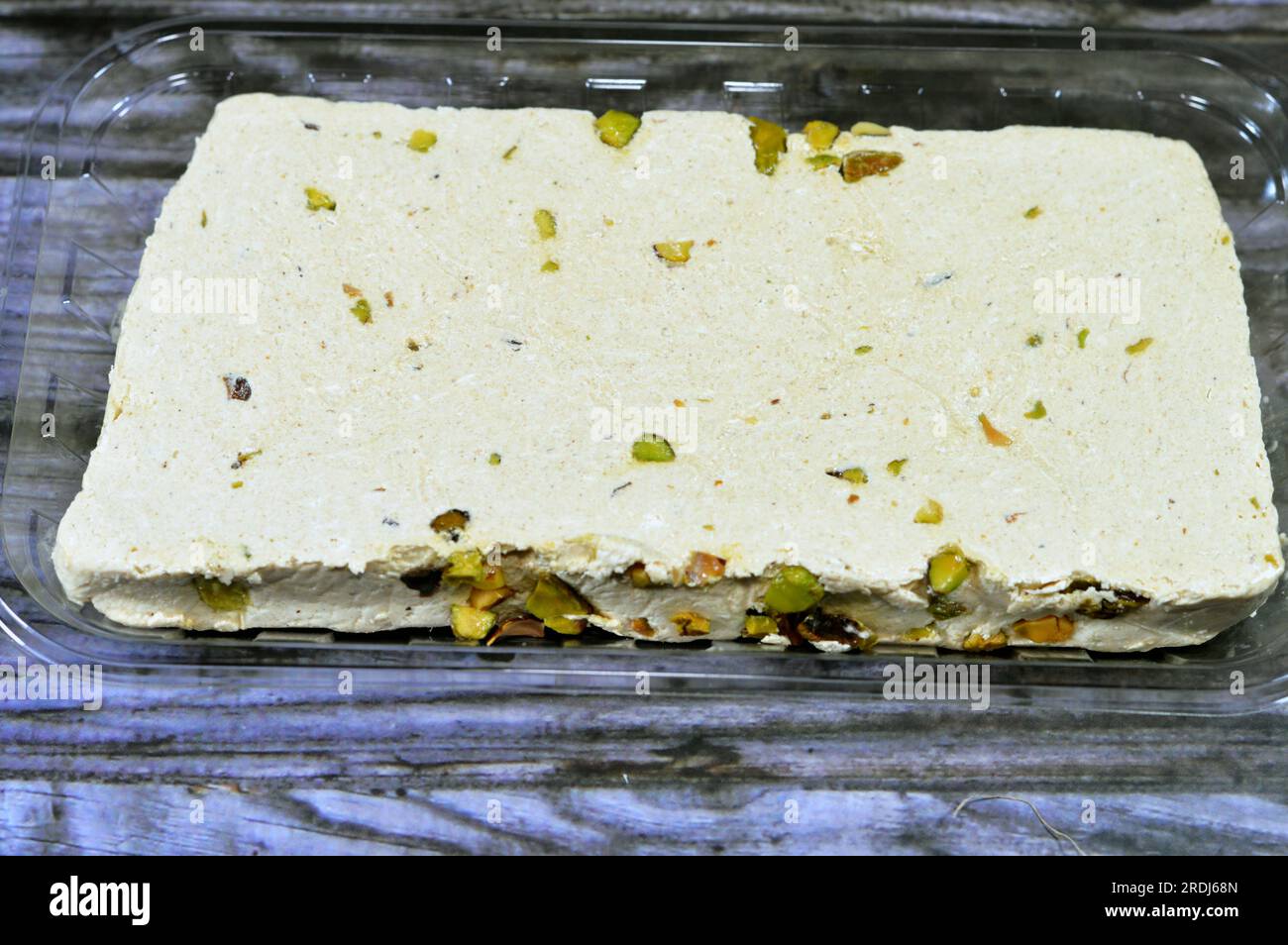Traditional tahini halva with pistachios or Halawa Tahiniya, the ...