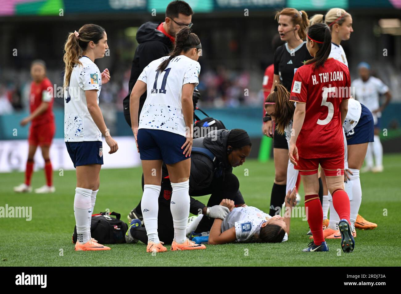 United States' Trinity Rodman grimaces in pain after being injured ...