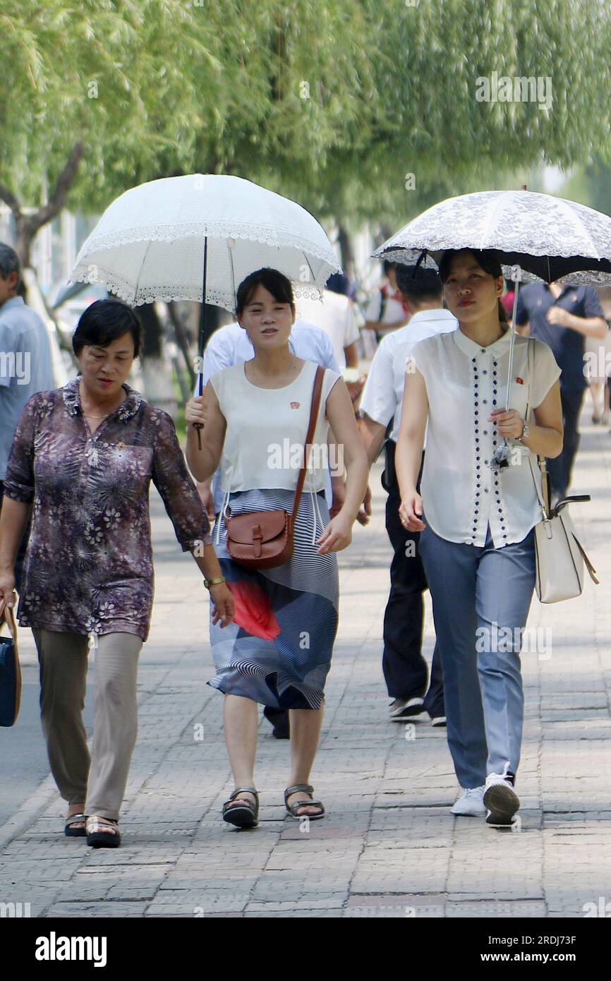 People walk in the Mirae Scientist street in Pyongyang, North Korea ...