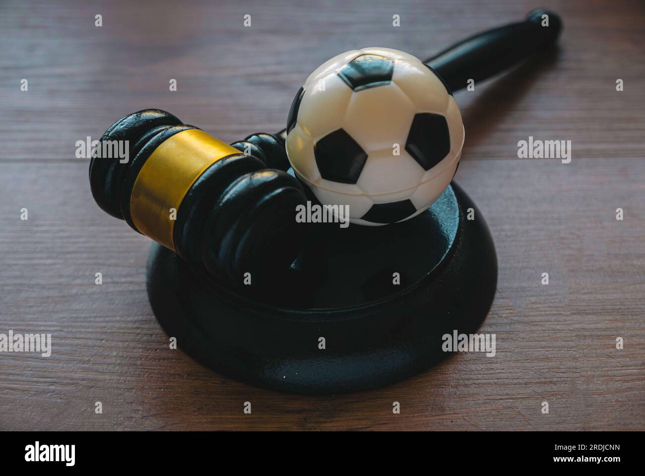 Law and soccer sport.Football coach accused. Concussion lawsuit Stock ...