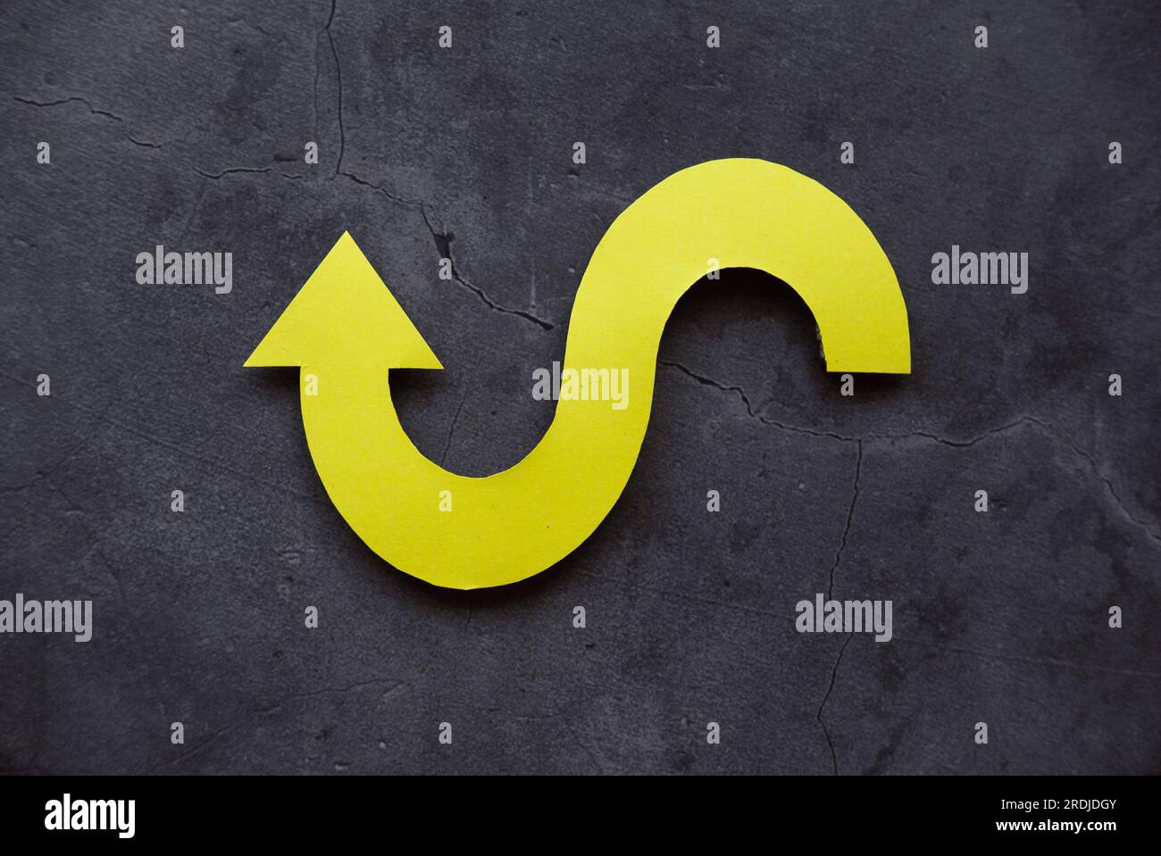 Yellow arrow pathway sign. Future life with direction or obsctacle ...