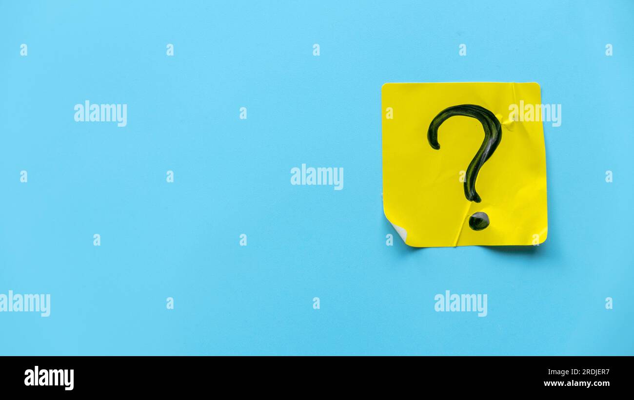 Q&A or questions and answers concept. Yellow sticker with handwritten ...