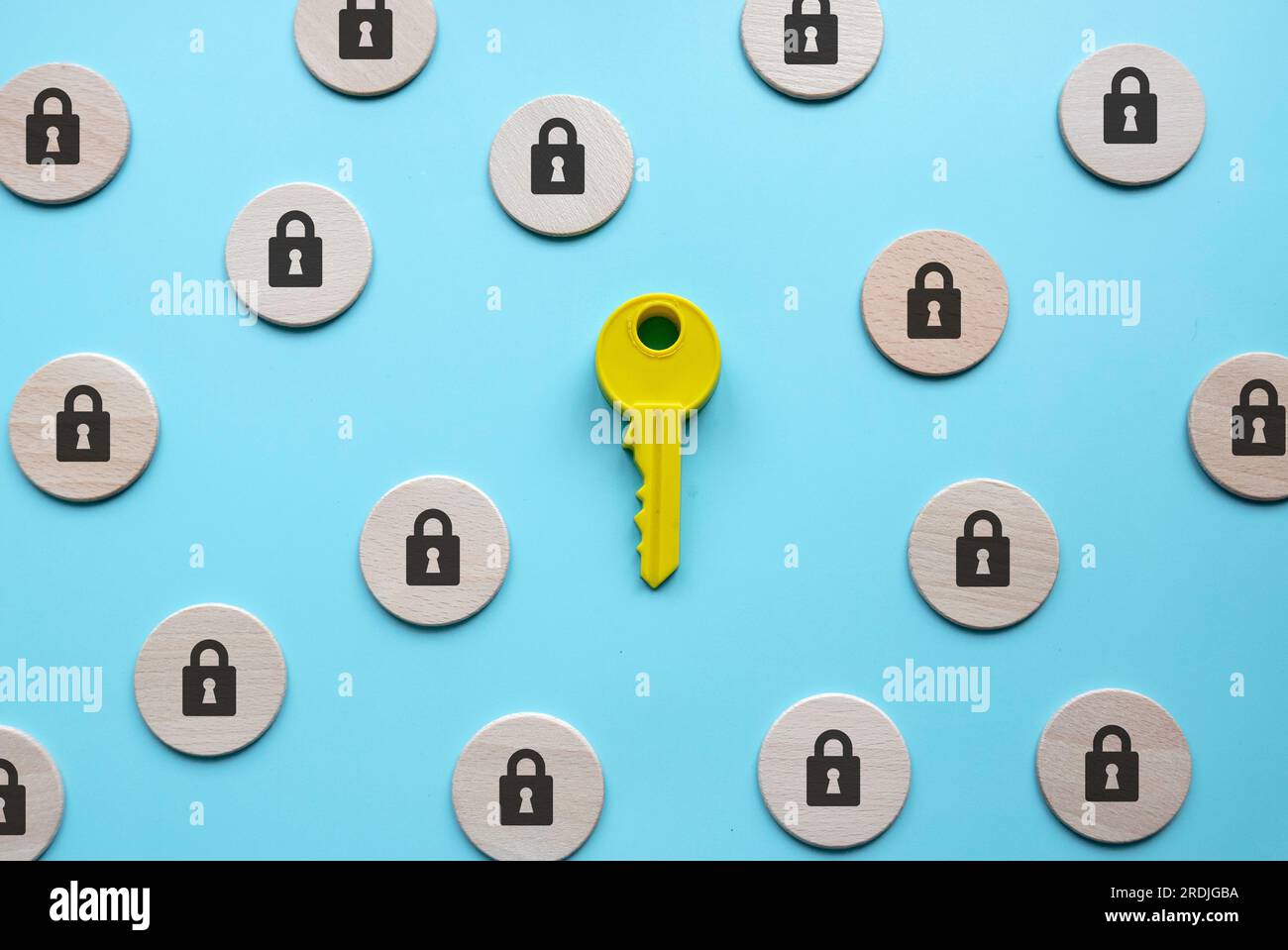 Security and protection concept. A yellow key among a padlock symbol ...