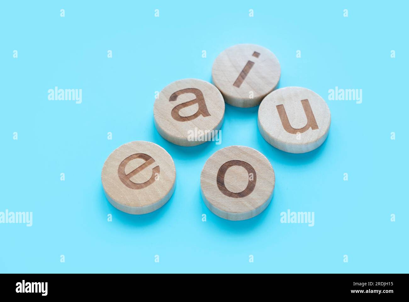 Learning english concept.Vowels of AEIOU on a blue background Stock ...