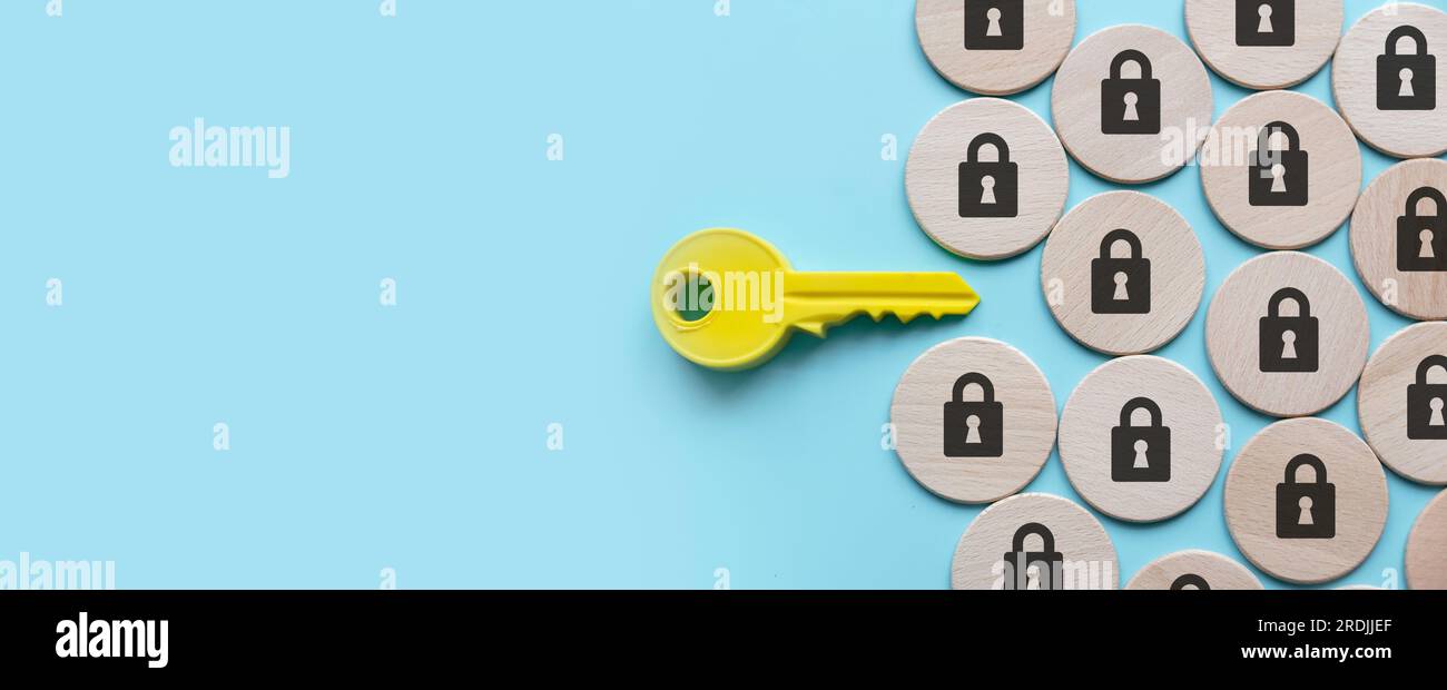 Security and protection concept. A yellow key among a padlock symbol ...