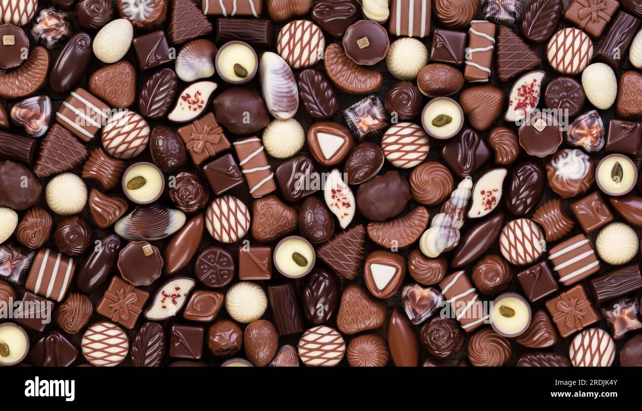 mix chocolate candy, sweet snack, food background Stock Photo - Alamy