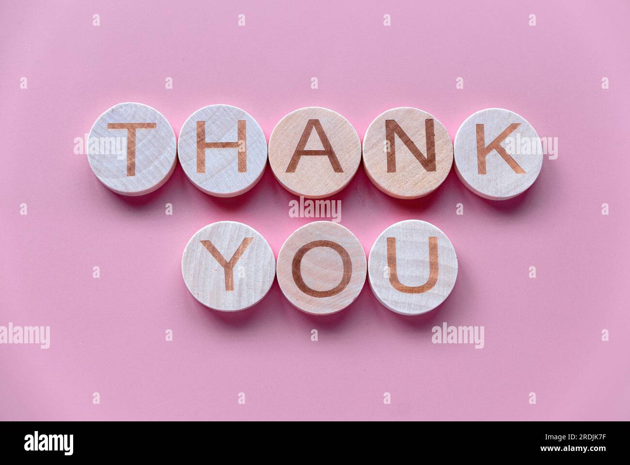 Alphabet word thank you on pink background Stock Photo - Alamy