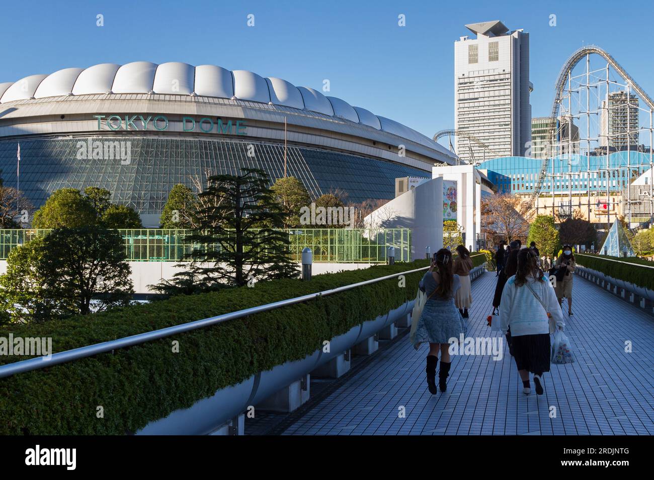 People walk near Tokyo Dome. Tokyo, Japan Stock Photo - Alamy