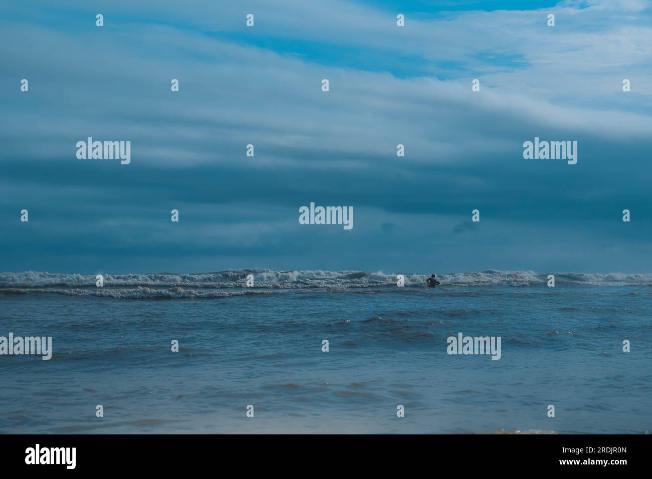 Rain clouds floating in the sky at Sugondha Sea Beach Stock Photo - Alamy