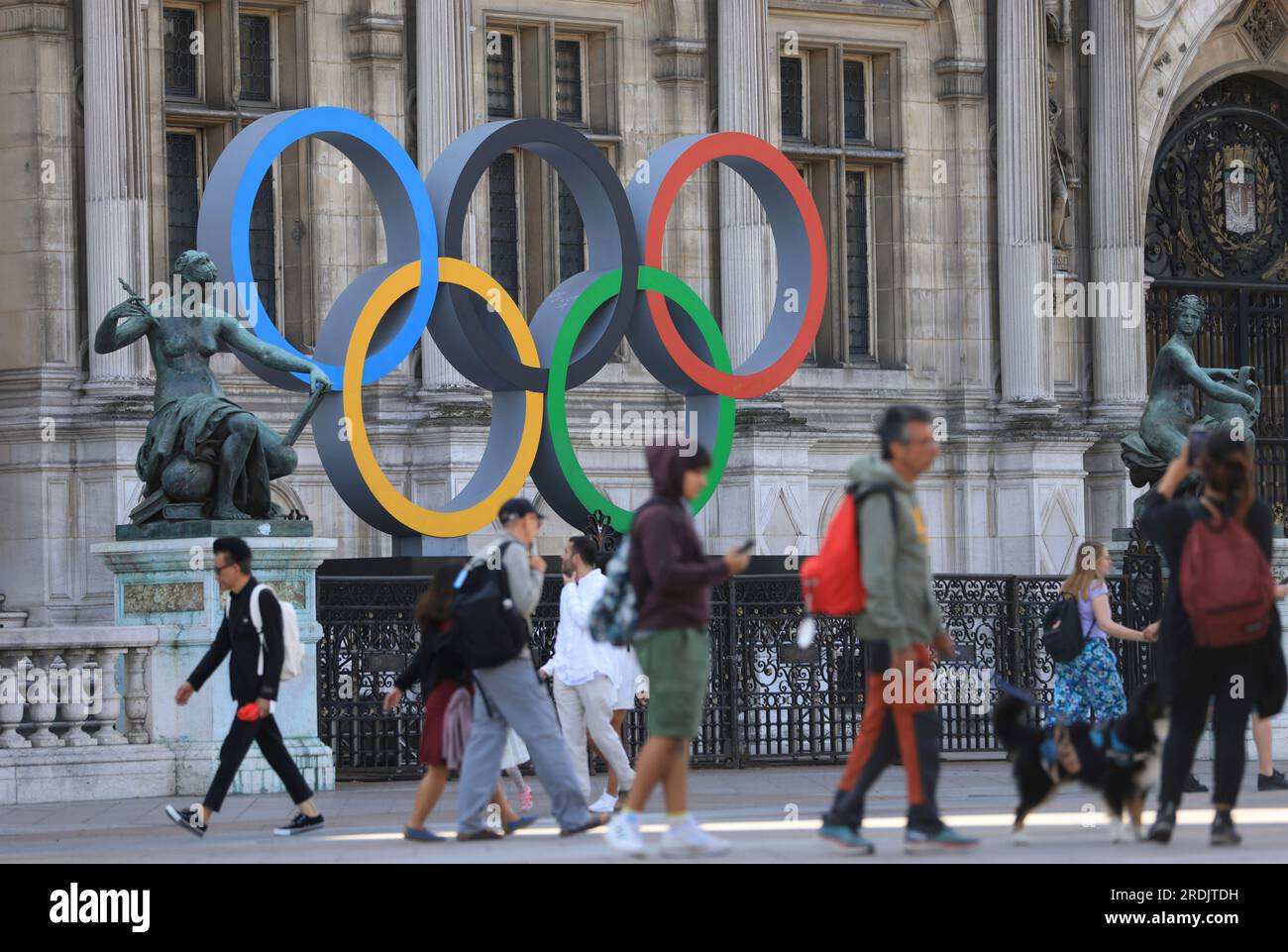 A photo shows the five-ringed Olympic symbol in front of Paris City ...