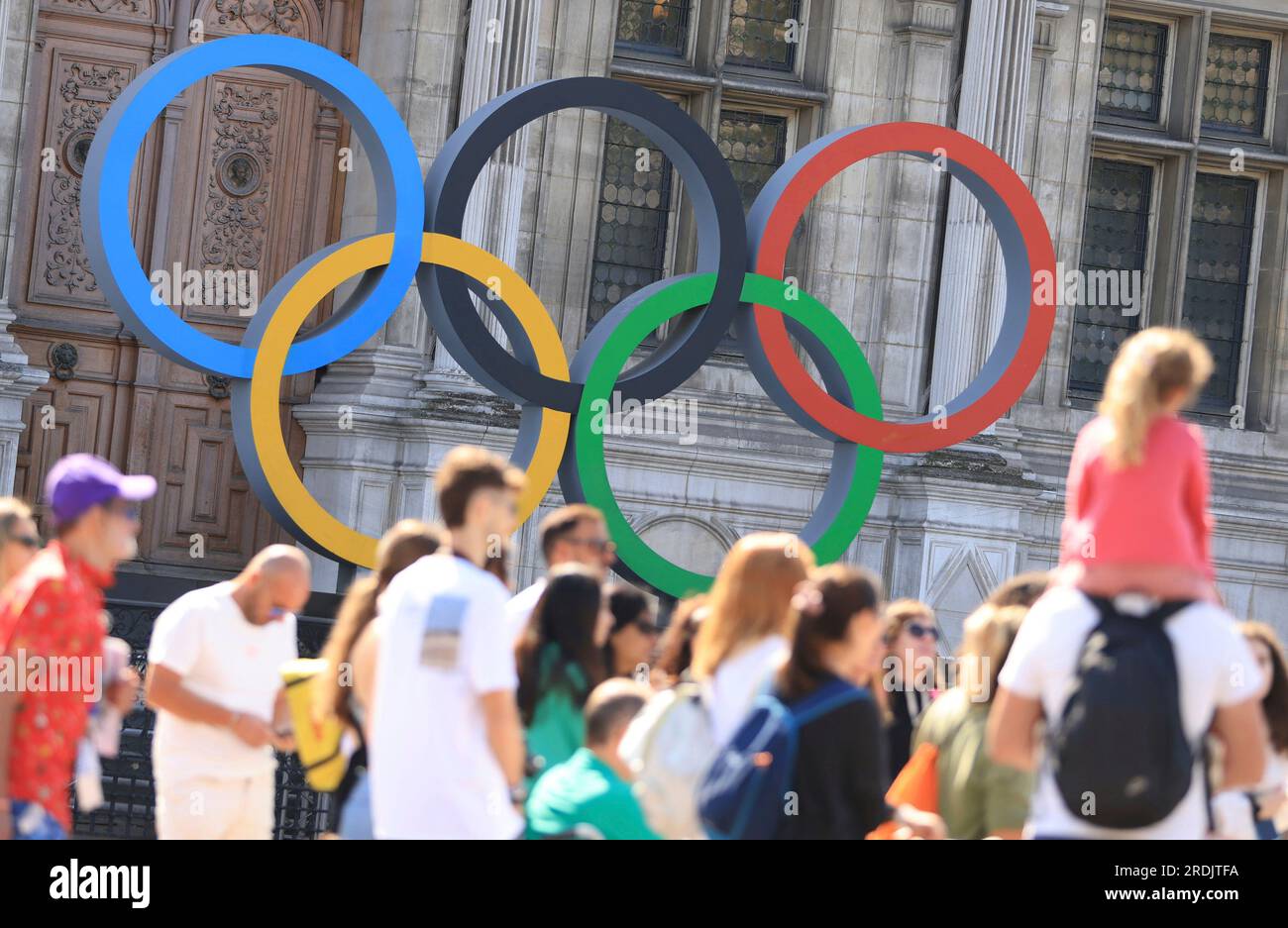 A photo shows the five-ringed Olympic symbol in front of Paris City ...