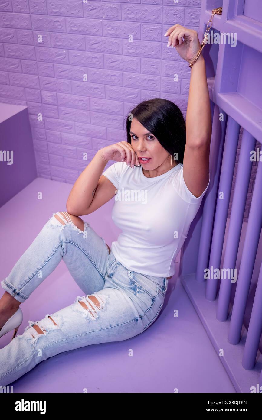 A beautiful asian model is jailed in a lavender cell waiting to plead ...