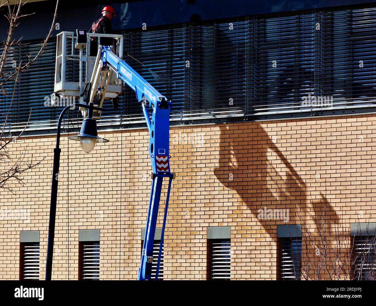 high level window cleaning. high pressure water jet. hydraulic work ...