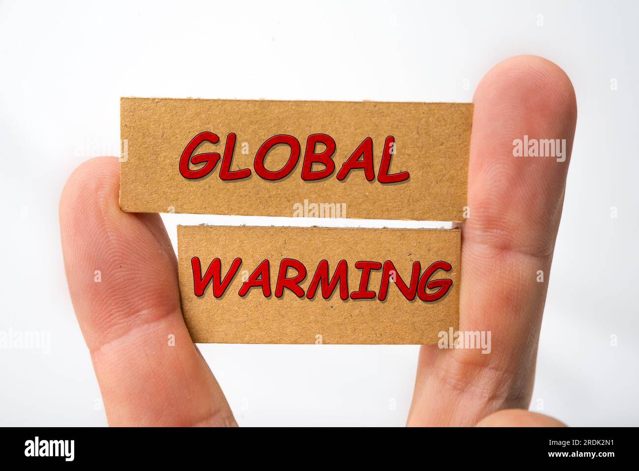 Global warming sign on a cardboard on a white Stock Photo - Alamy