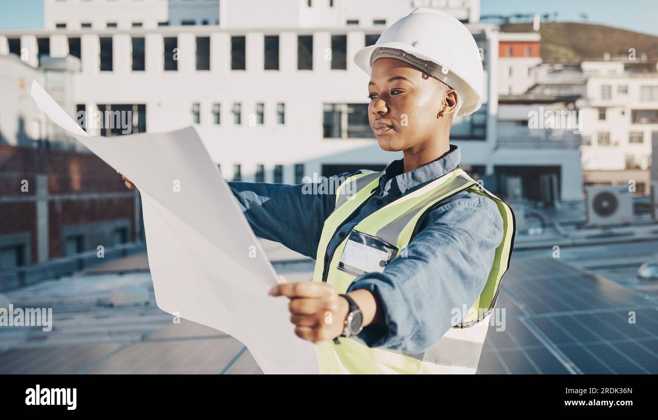Female engineer, solar panel blueprint or outdoor on rooftop for power ...