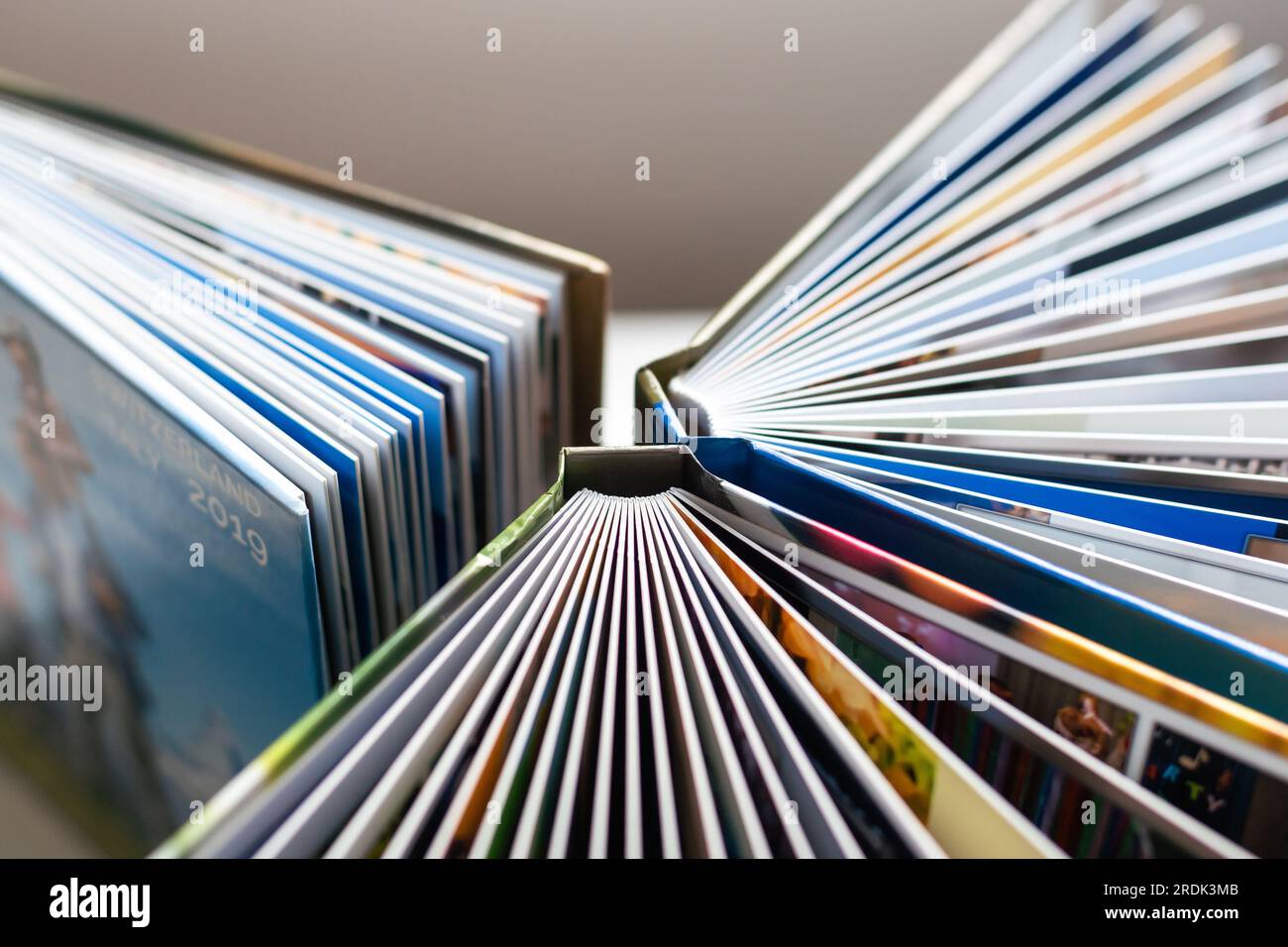 The spines of photo books. The view from the top Stock Photo - Alamy