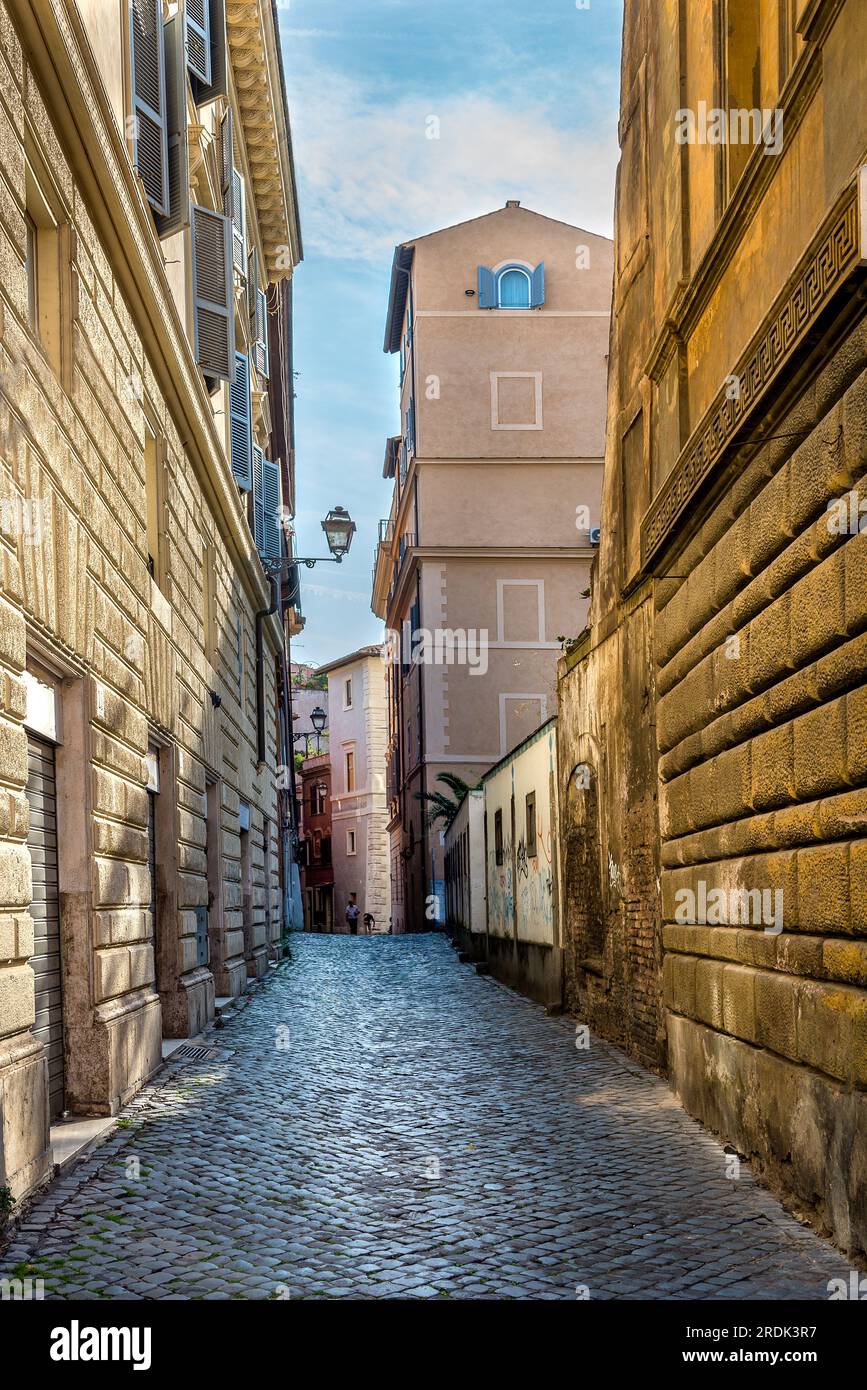 Narrow italian street in the morning Stock Photo - Alamy
