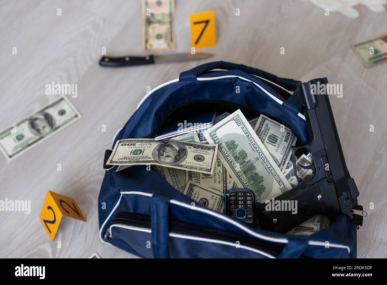 Guns and drugs concept - top view of cocain packages, drug bags and gun ...