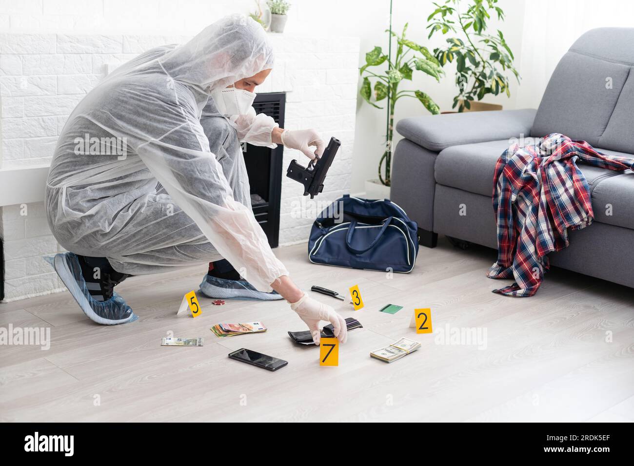 Detective Collecting Evidence in a Crime Scene. Forensic Specialists ...