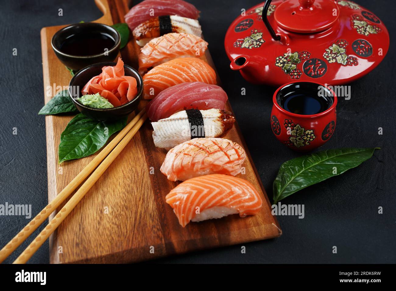 Japanese traditional Cuisine - Set of Nigiri sushi topped with sake ...