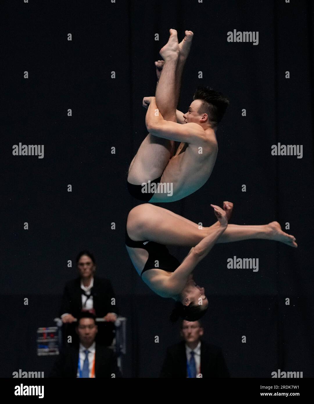Clare Cryan and Jake Passmore of Ireland compete in the mixed diving 3m ...