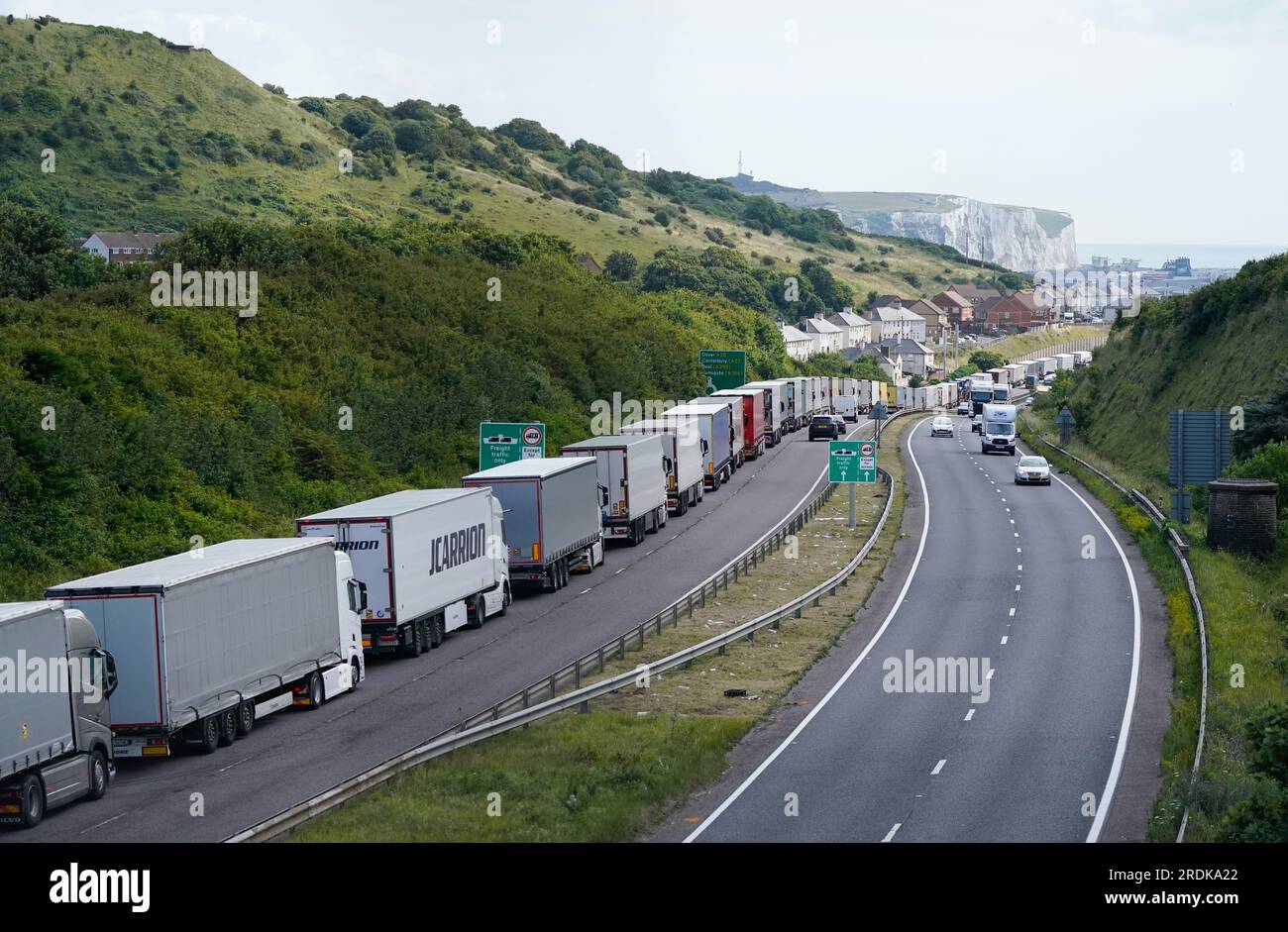 Lorries queue along the A20 in Kent as they wait to enter the Port of ...