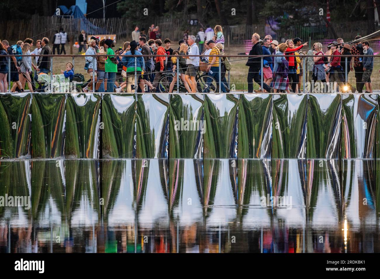 Henham Park, Suffolk, UK. 21st July, 2023. People come in over the main ...