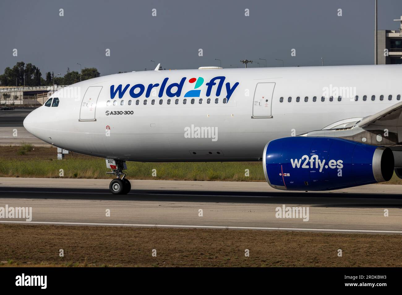 World 2 Fly Airbus A330-343 (Reg.: CS-TRH) departing Malta after having ...