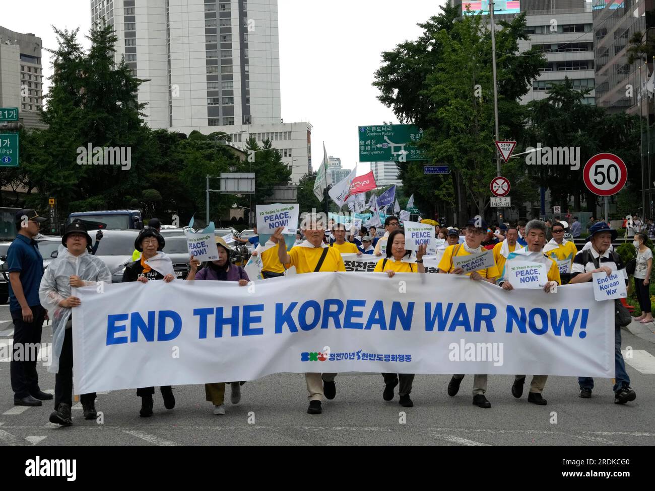 Participants march during a rally for peace unification of the Korean ...