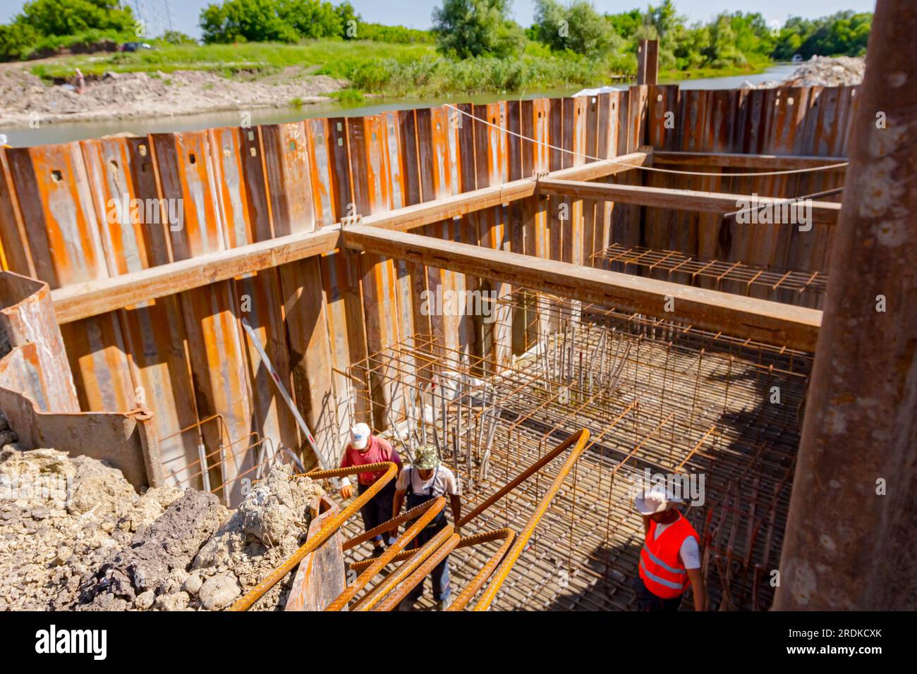 Selected rusty steel bended reinforcement bars placed at construction ...